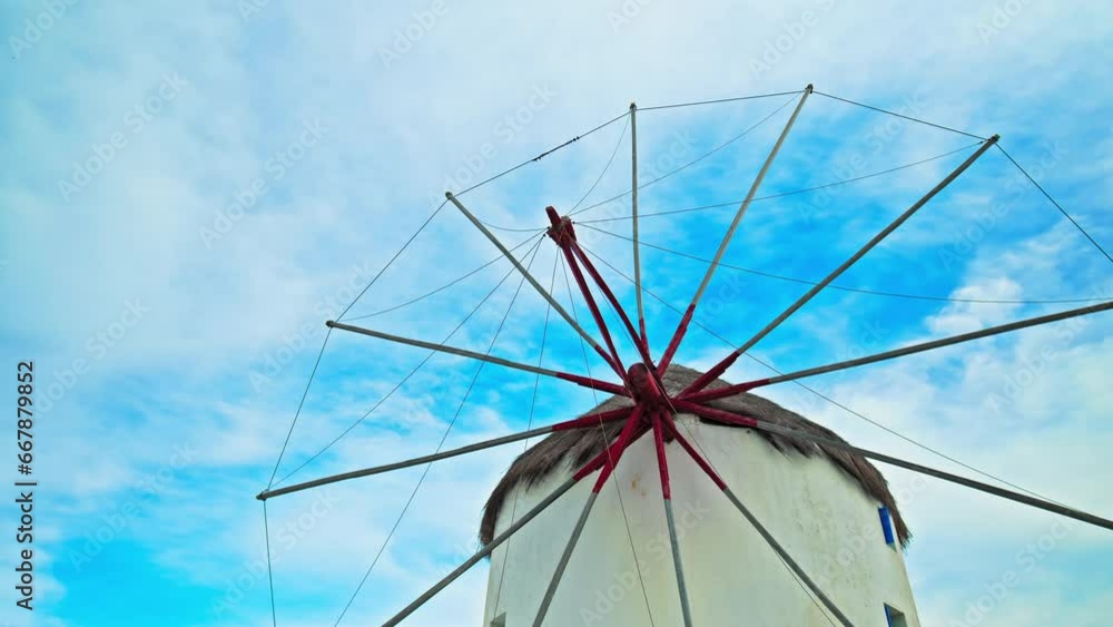 Panoramic view of the iconic old Greek windmills on Mykonos island. A ...