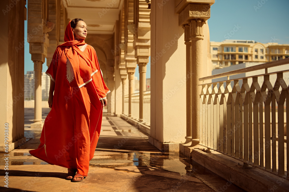 Full length portrait gorgeous Arab Muslim woman in traditional strict ...