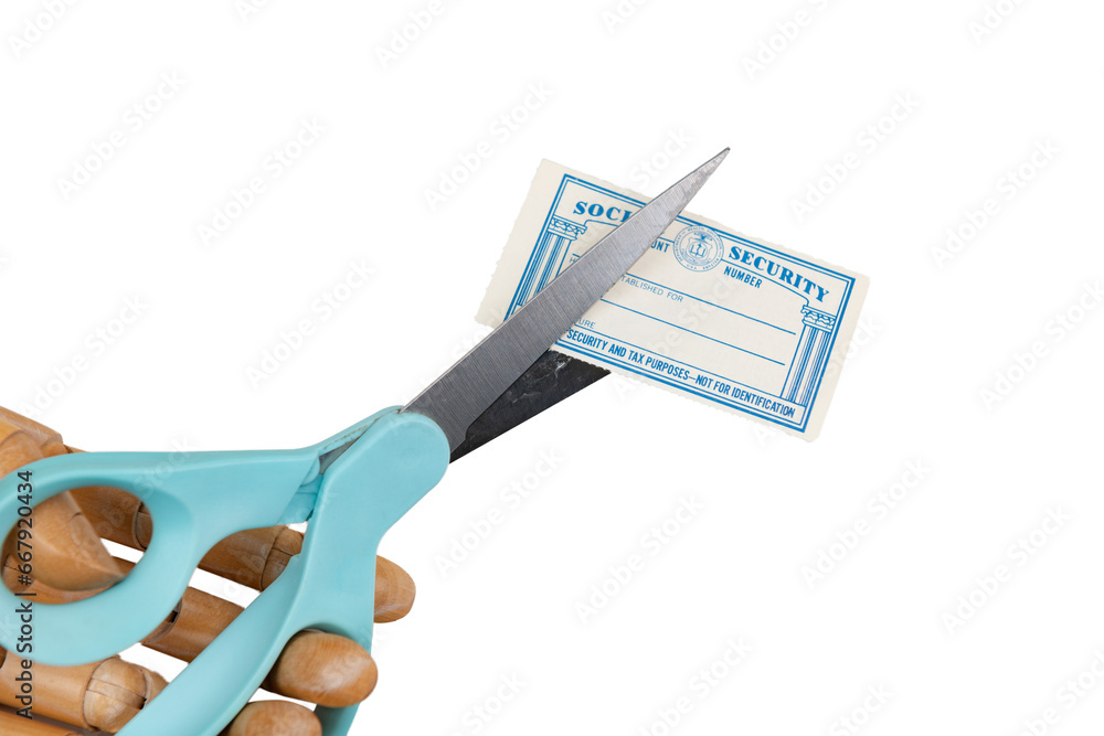 Cuts to Social Security concept with isolated scissors cutting a blank ...