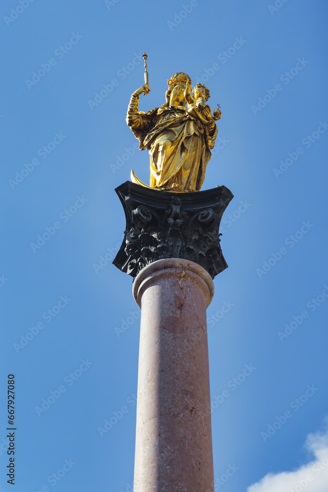 Virgin Mary on the Marian columns on the Marienplatz in Munich, Bavaria ...