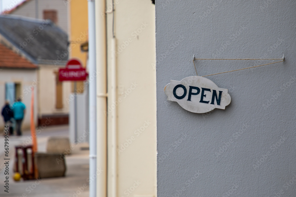 Open label open sign on wall facade entrance for welcome customers to ...