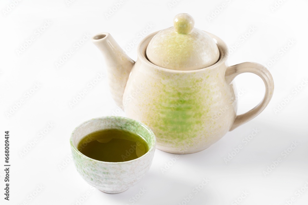 Hot Japanese green tea Green tea in a tea glass on a white background ...
