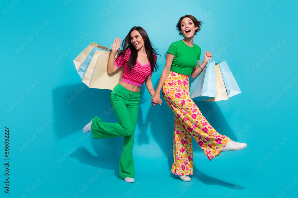 Full body photo of two best friends girls overjoyed together boogie ...