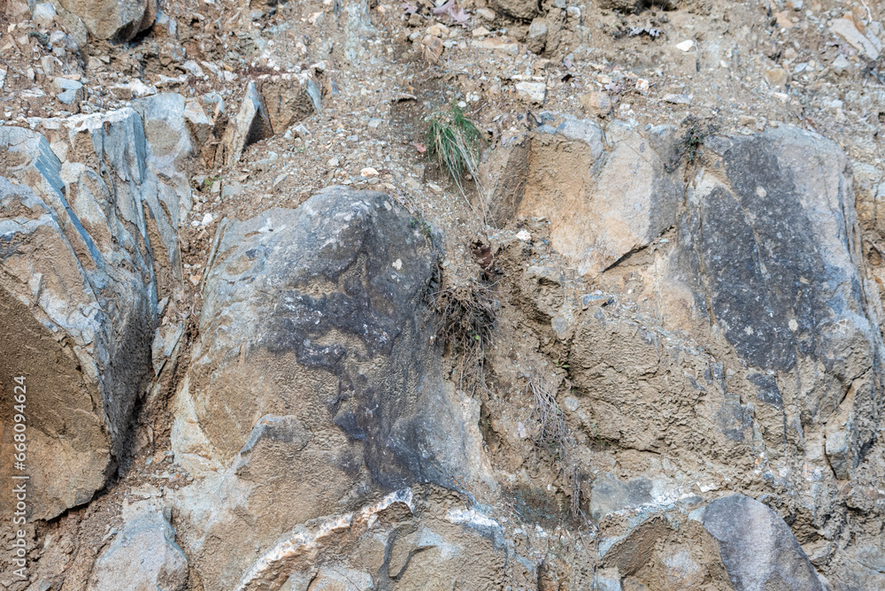Rock structure, background. Natural rock background. Cracks and natural ...