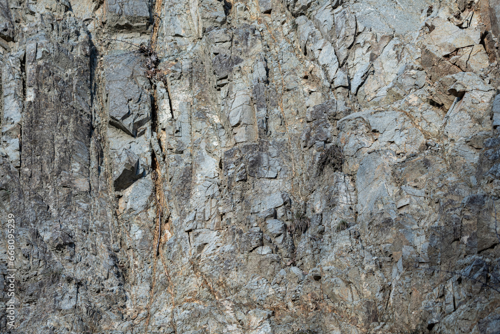 Rock structure, background. Natural rock background. Cracks and natural ...