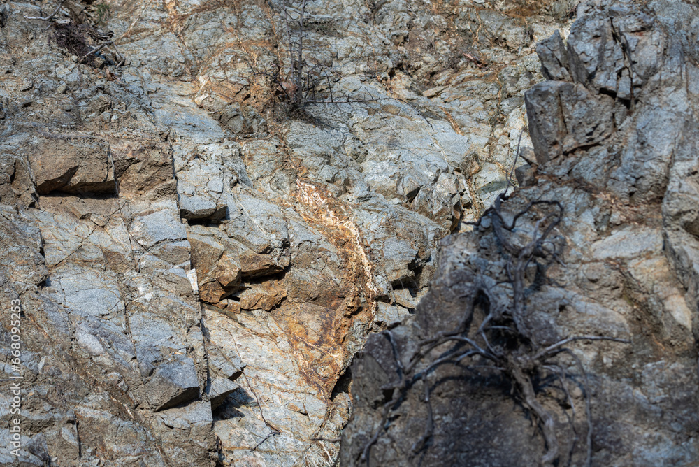 Rock structure, background. Natural rock background. Cracks and natural ...