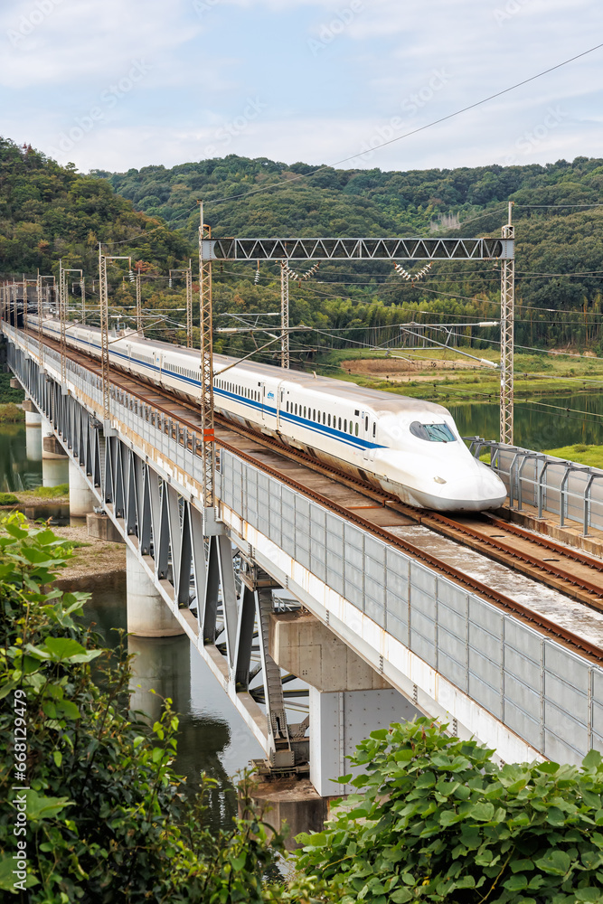 Shinkansen N700 high-speed train operated by Japan Rail JR on Sanyo Shinkansen line in Kurashiki ...