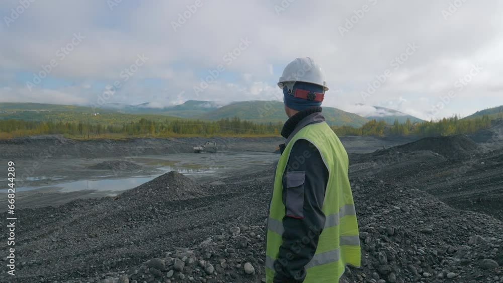 Surveyor supervises the gold metal excavation process at the mine ...