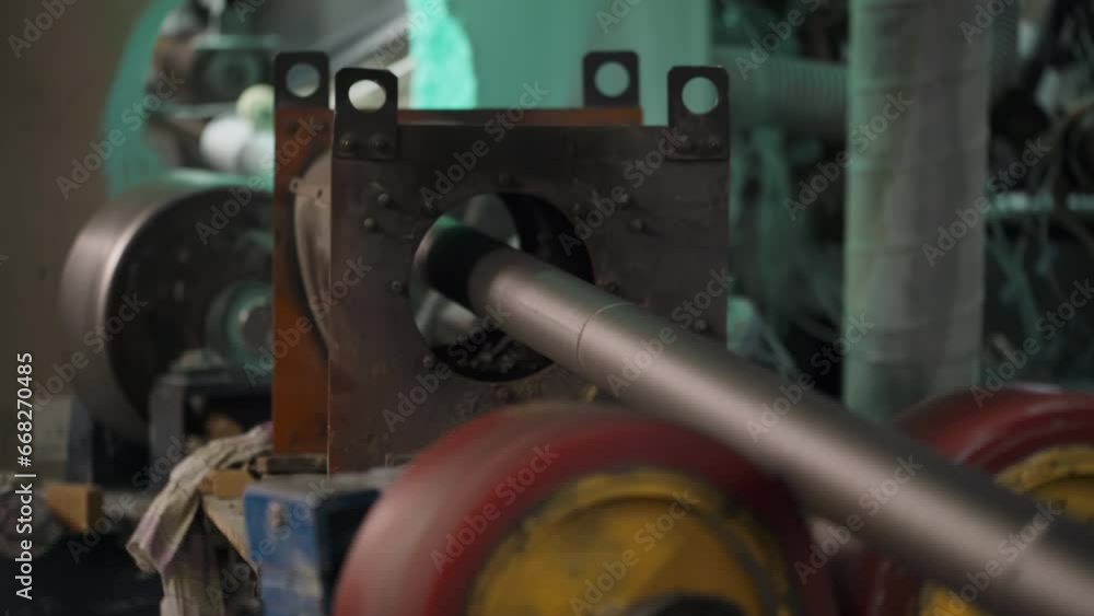Close-up of a pipe manufacturing process at the industrial plant ...