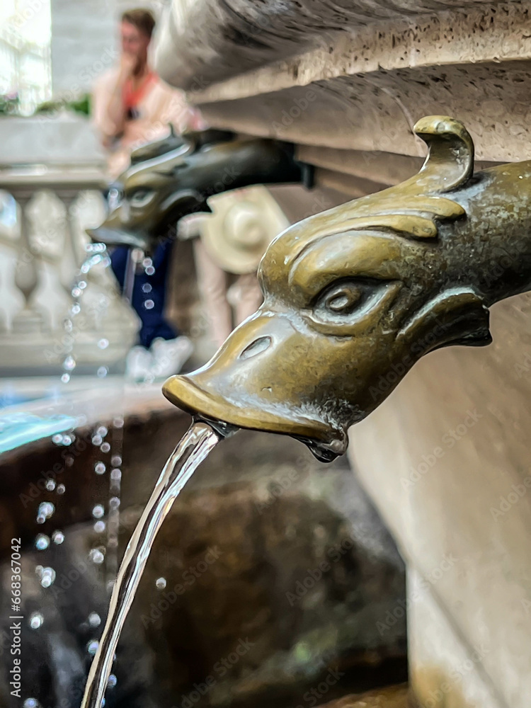 Decorative water outlets from the fountain at St. Peter's Basilica are ...