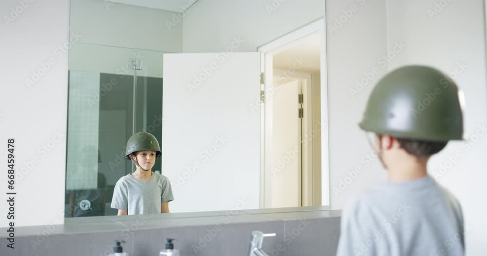 Pretend soldier, child with helmet in home and salute in mirror in ...