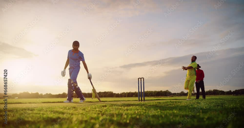 Indian Cricket Bowler in Yellow and Green Uniform Running and Throwing ...