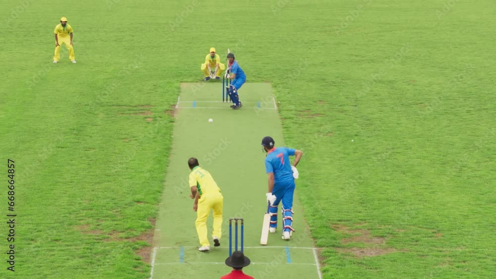 Vidéo Stock South Asian Cricket Bowler in Yellow and Green Uniform ...