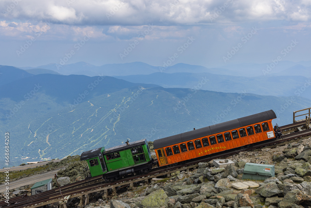 Cogwheel train completing the last and steep stretch on the track to ...
