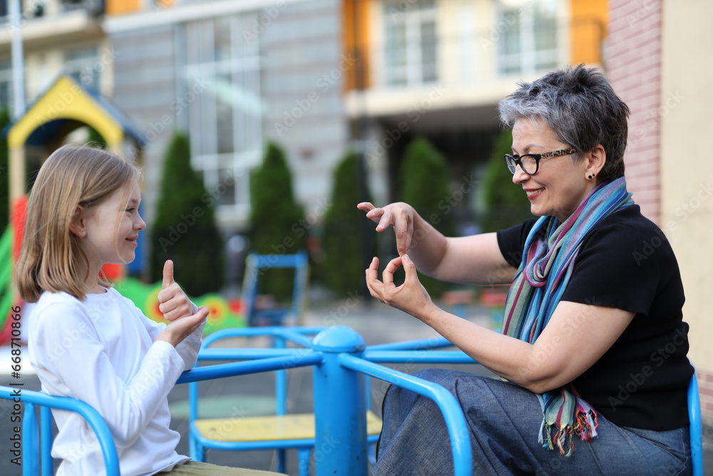 An intergenerational bond, senior and young - share the happiness of ...