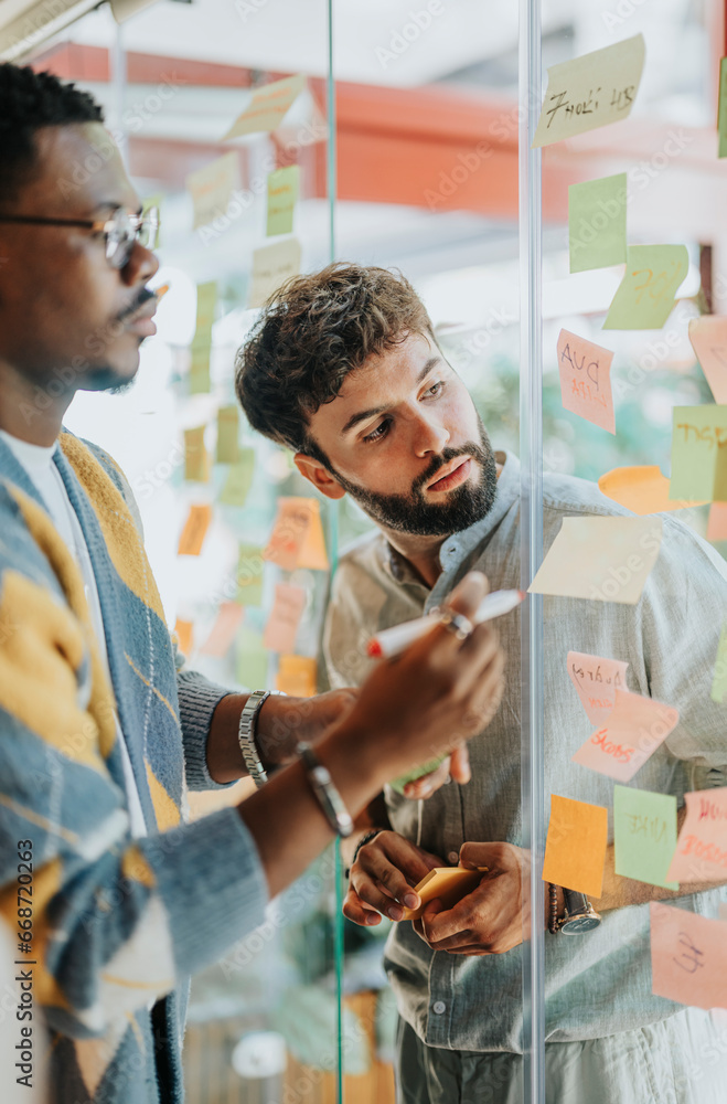 Diverse group brainstorming, collaborating and sharing ideas in an ...