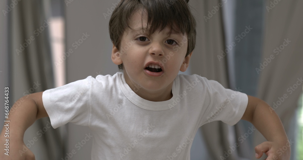 Upset child emotion i. Close-up of angry little boy expressive face ...