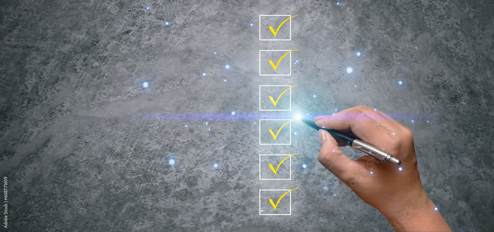 Businesswomen mark checklist boxes with pen, Checklist concept ...