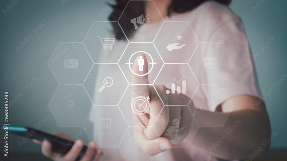 Business people touching on screen to target customer. Target customer ...