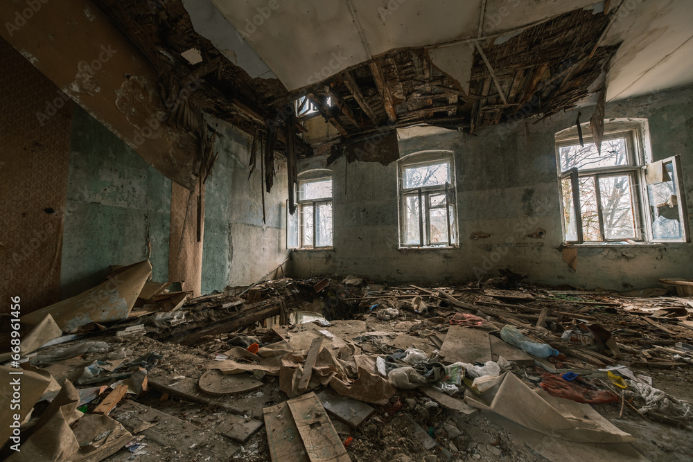 From above of interior of spacious hall with glass windows and heap of ...