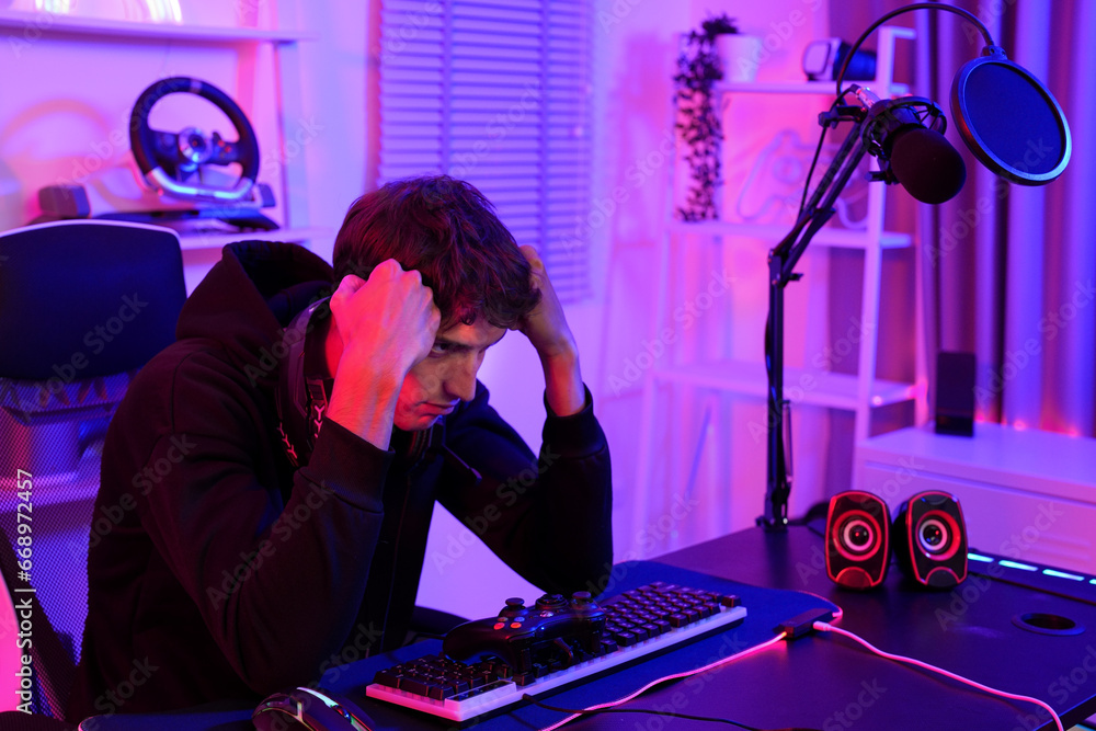 Caucasian streamer boy stress about e sport competition championship ...