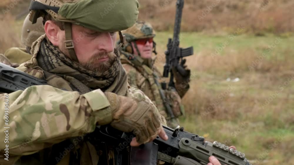 The attack on the enemy is carried out by soldiers with weapons and ...