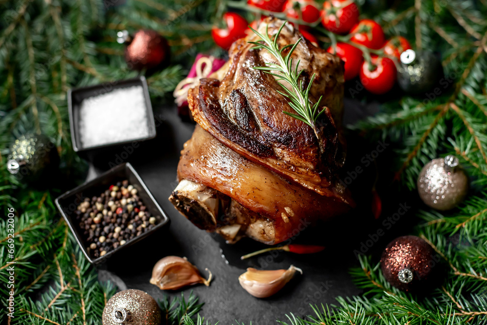 Christmas pork knuckle baked in the oven against the background of a ...