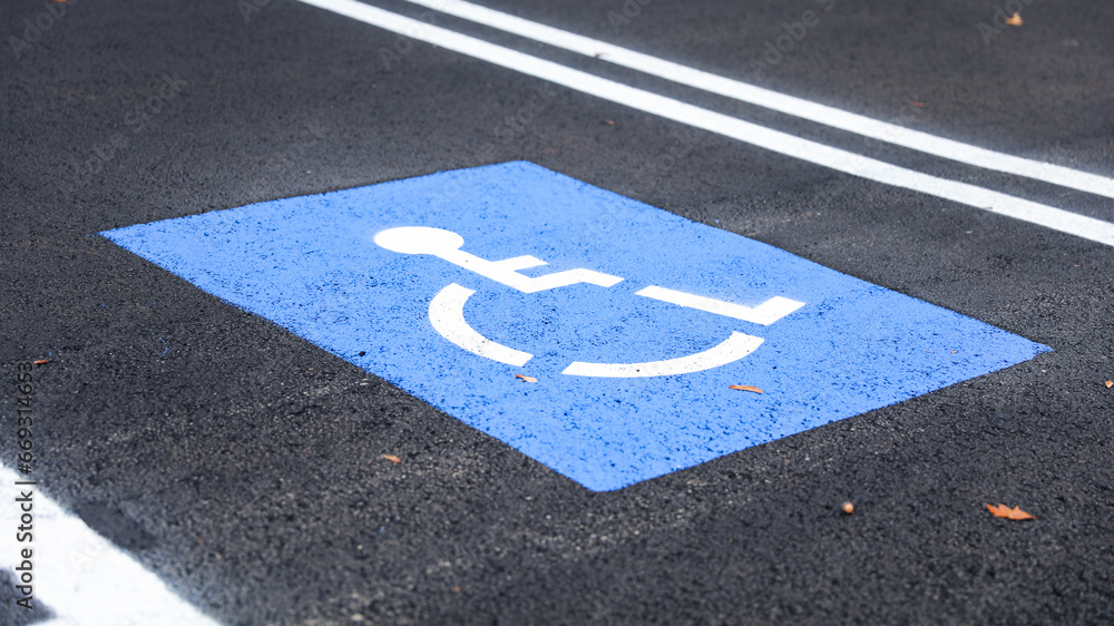 wheelchair accessibility sign against a vibrant urban backdrop ...