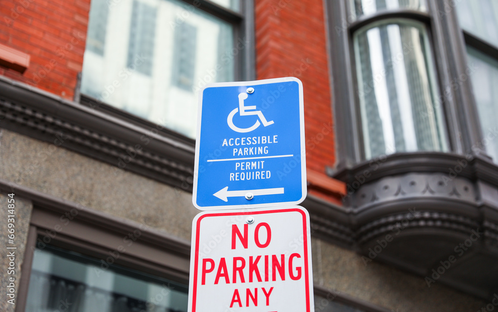 wheelchair accessibility sign against a vibrant urban backdrop ...