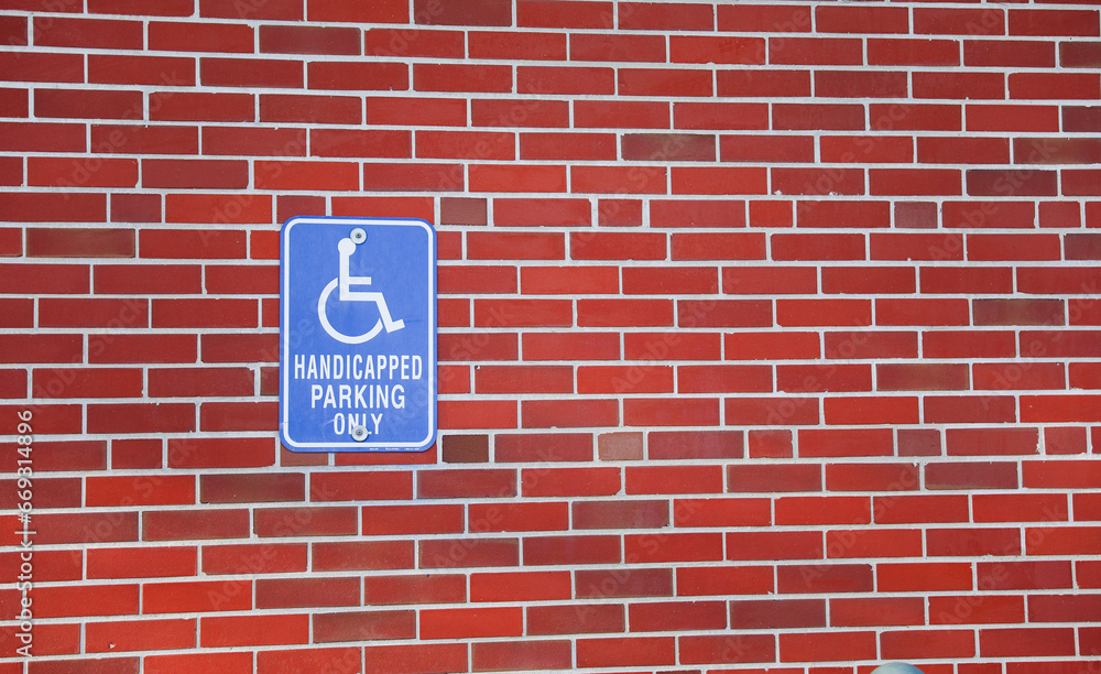 wheelchair accessibility sign against a vibrant urban backdrop ...