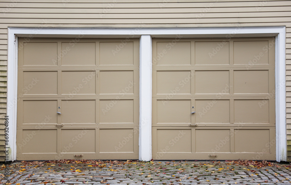 garage door stands tall, symbolizing security and convenience. A ... garage door stands tall, symbolizing security and convenience. A ...