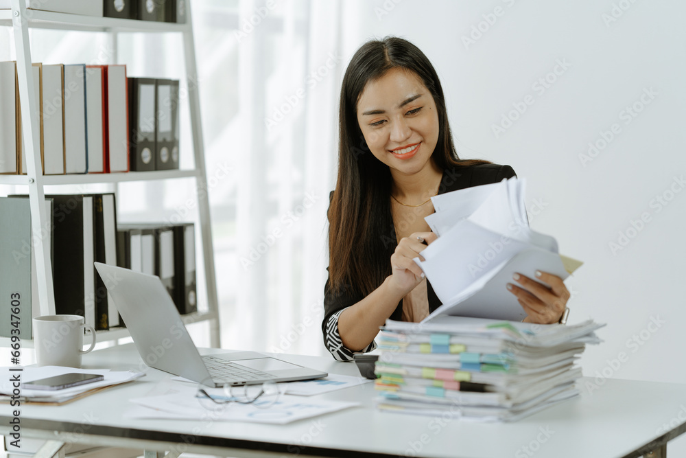 Businessman man working in stacks of papers searching for unfinished ...