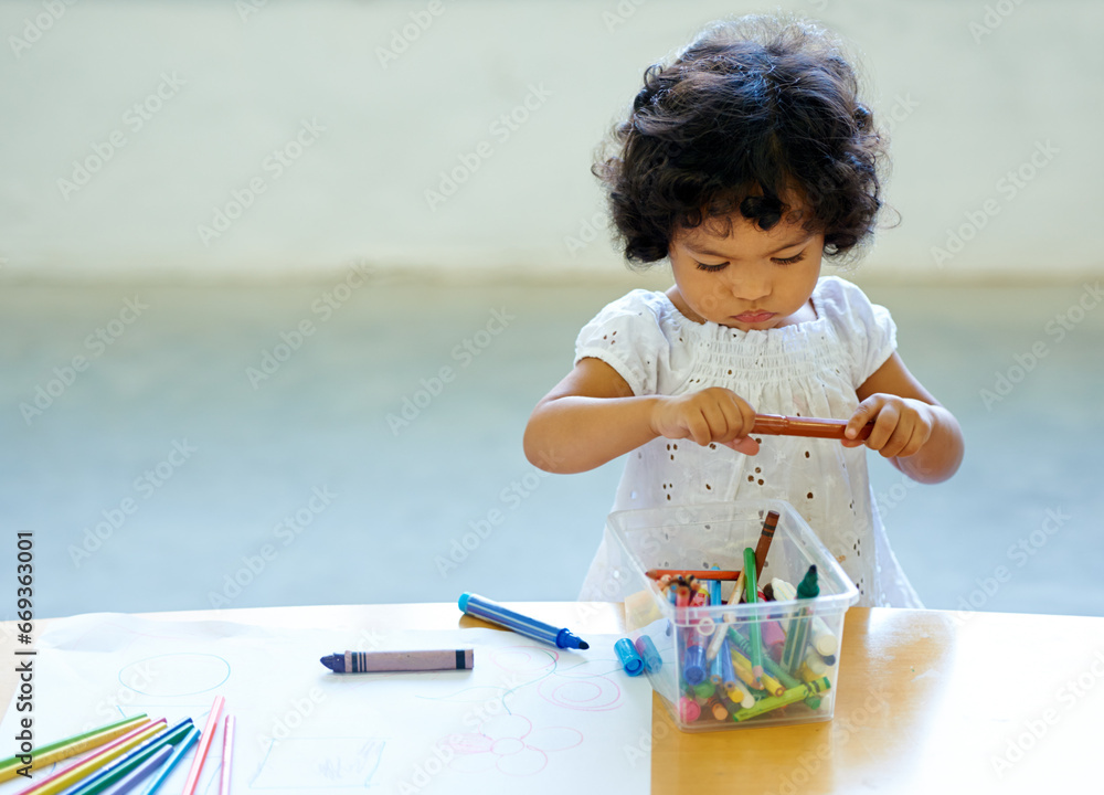 Young girl, crayons and drawing in classroom for creative development ...