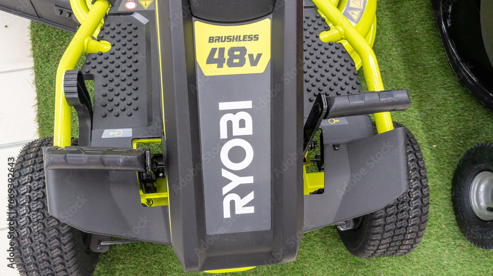 Ryobi lawnmower tools logo sign and brand text in brushless 48v riding ...