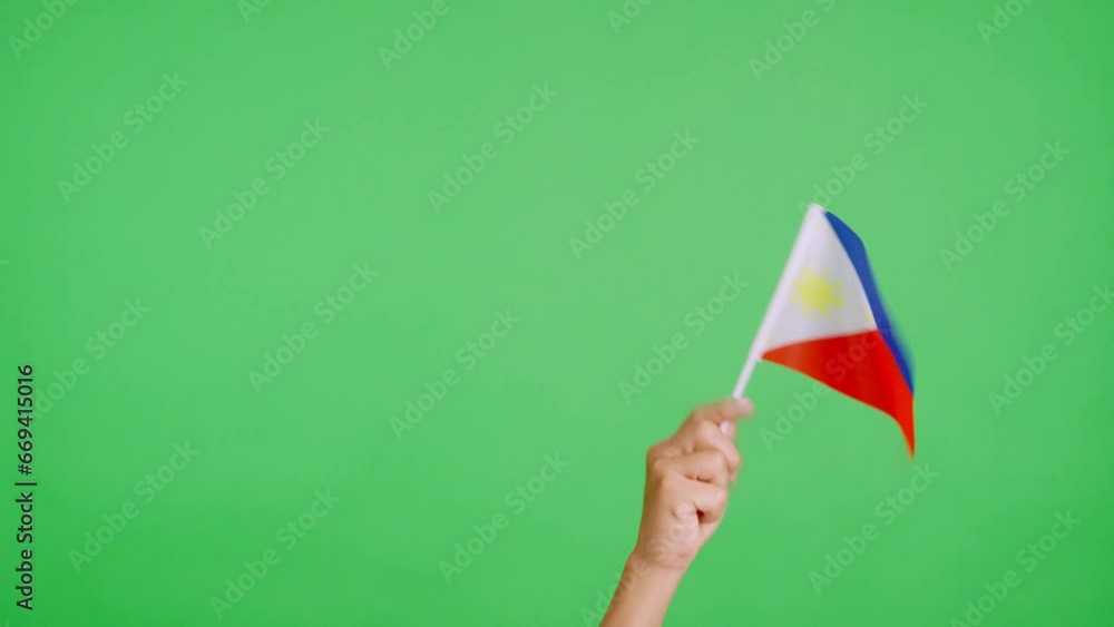 Hand waving a pennant of a philippine national flag Stock Video | Adobe ...