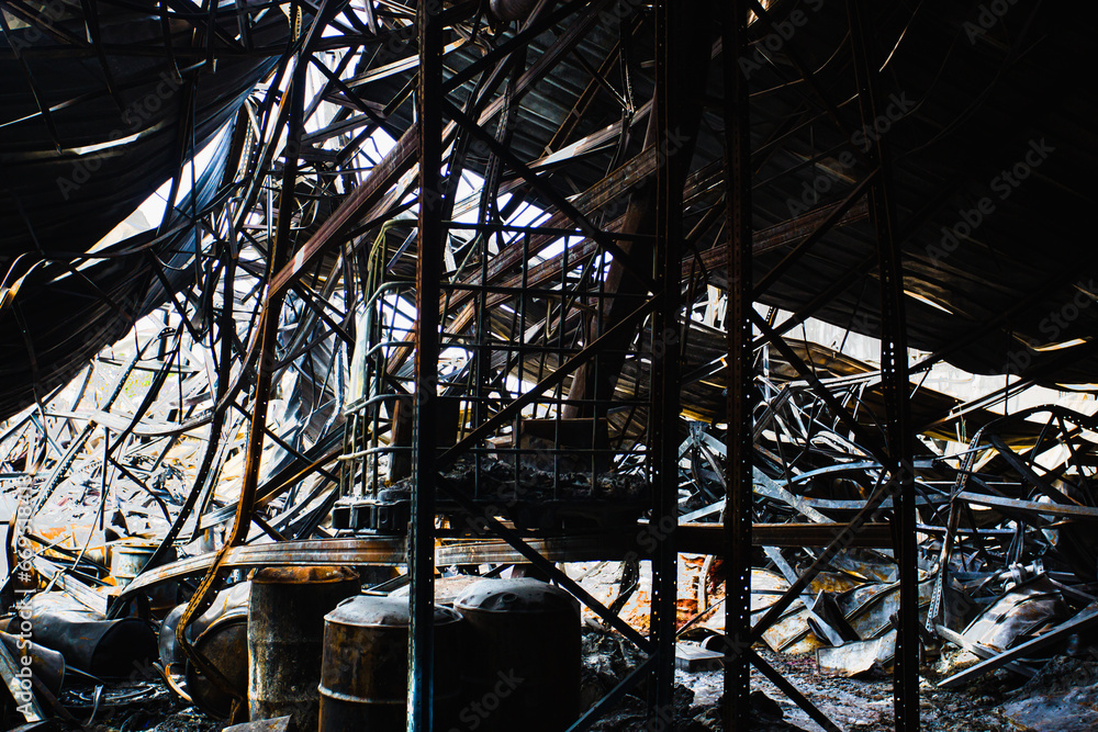 Burnt interiors of ruined factory building after fire, Misfortune in ...