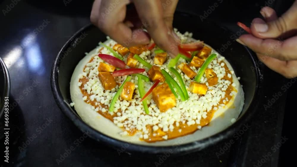 Homemade Indian pizza with Maida base with paneer, cheese and ...