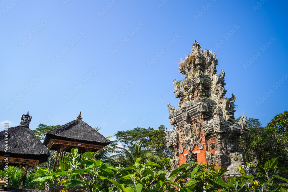 Balinese traditional temple building called pura with clear blue sky ...