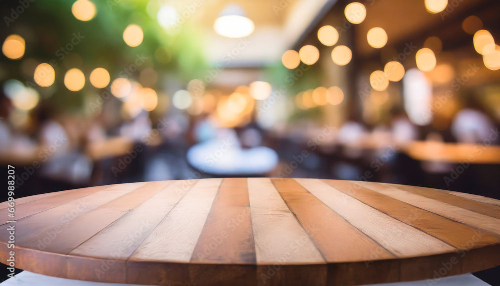 empty wood table top of round on blur restaurant background product ...