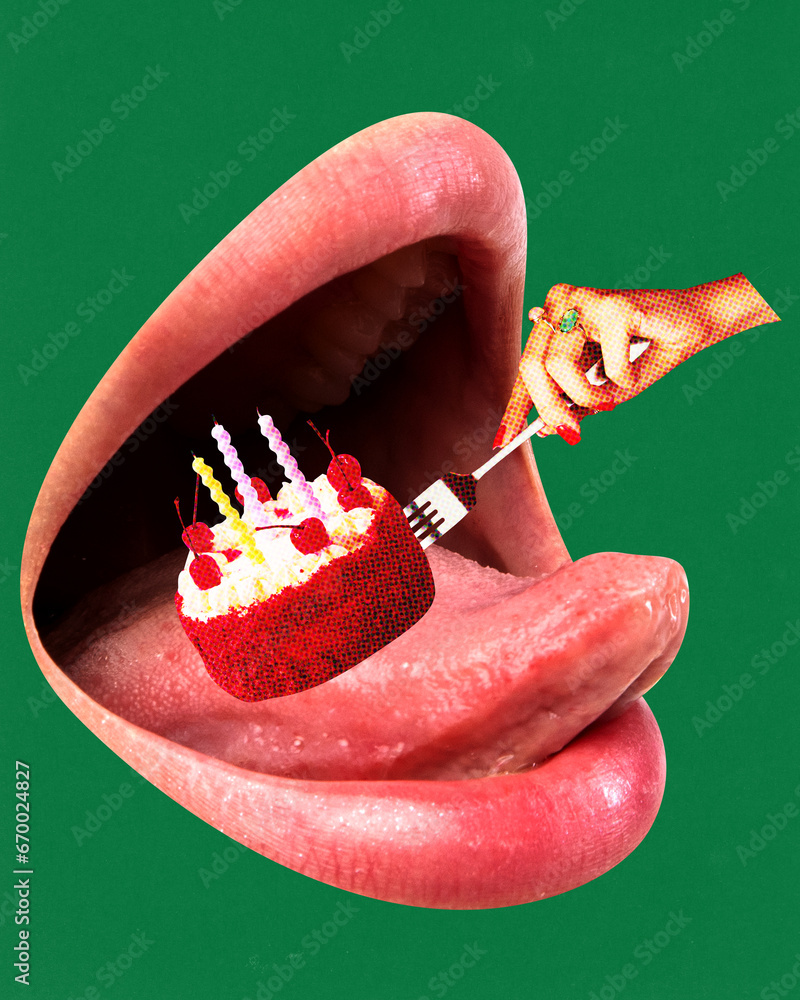 Female hand putting birthday cake with candles in giant open female mouth over green background ...