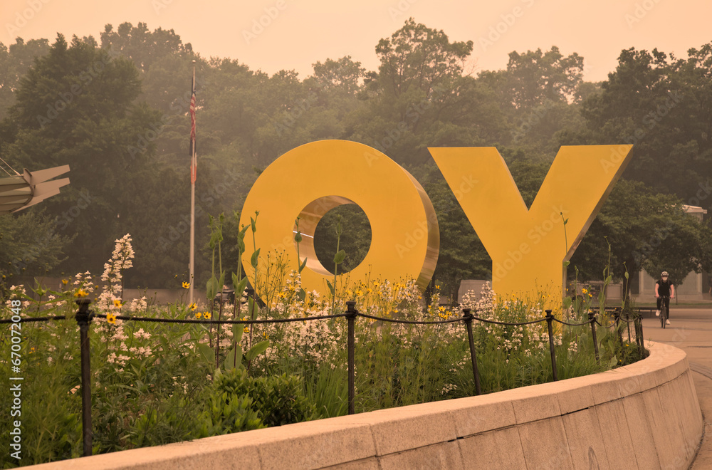 Brooklyn Museum's OY YO sign with smoke in the background from Canadian ...