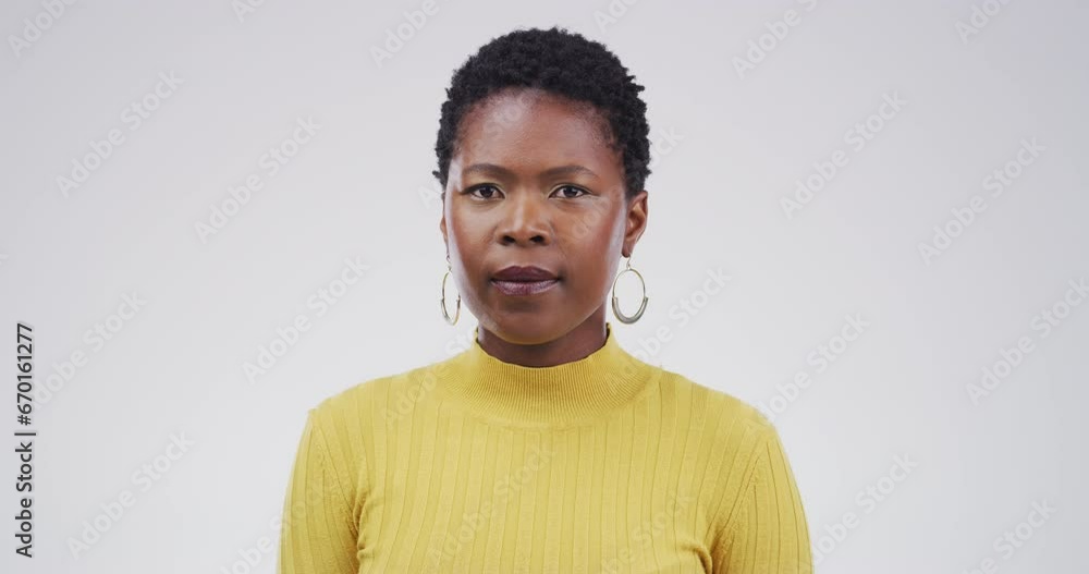 Black woman, face and blank stare standing in confidence isolated on a ...