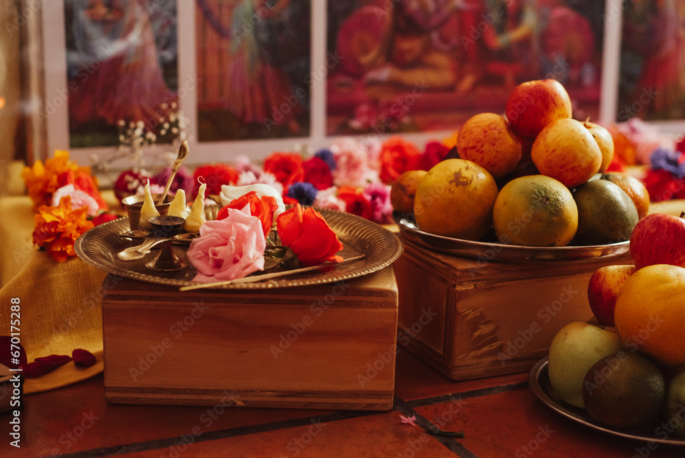 Colourful Hindu altar with offerings for a kirtan celebration honoring ...