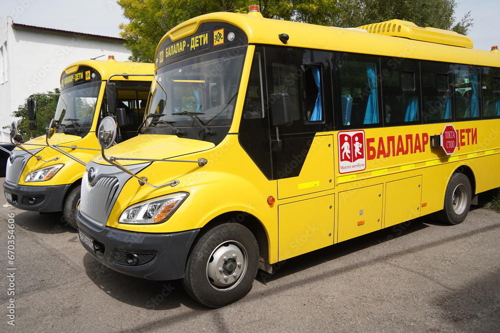 Almaty, Kazakhstan - 09.06.2023 : A yellow school bus with the ...