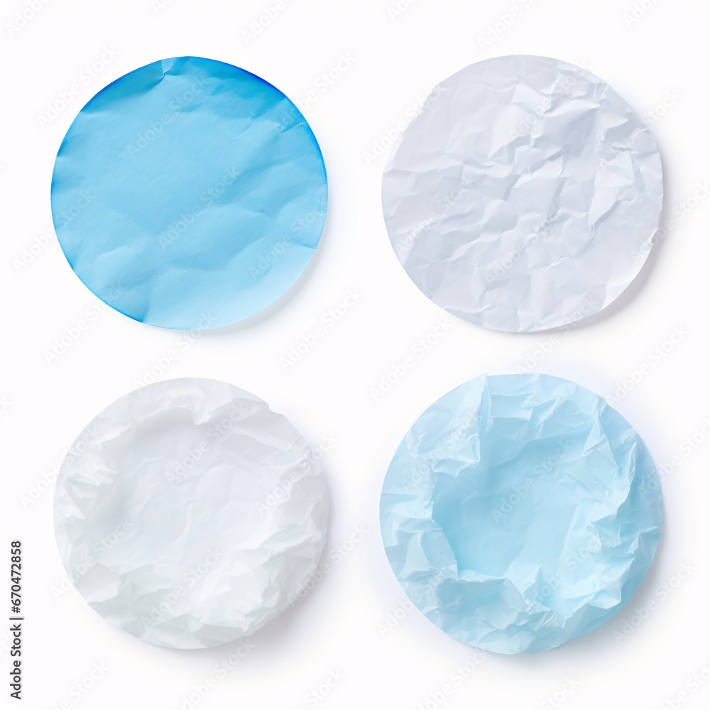 four pieces of paper that have crumples and blue white spots on them on ...
