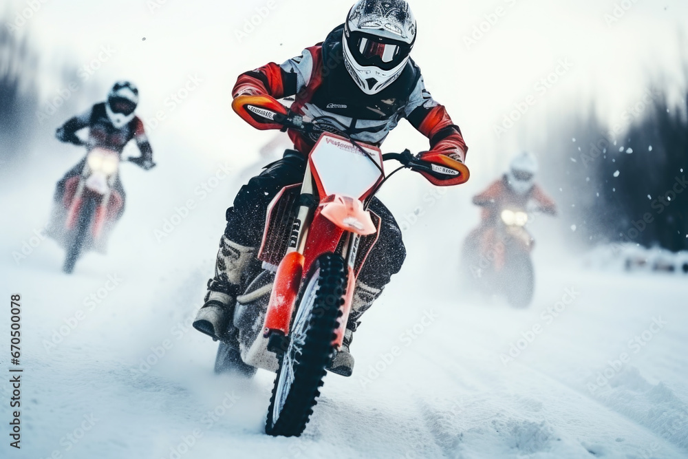 Motocross riders in action on the snow. Motocross winter extreme sport ...