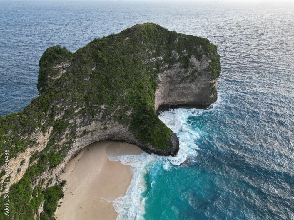 Drone aerial view of famous dinosaur (T-rex) shaped rock in turquoise ...