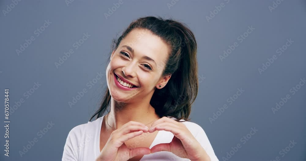 Happy woman, heart hands and love emoji for care, support or compassion ...