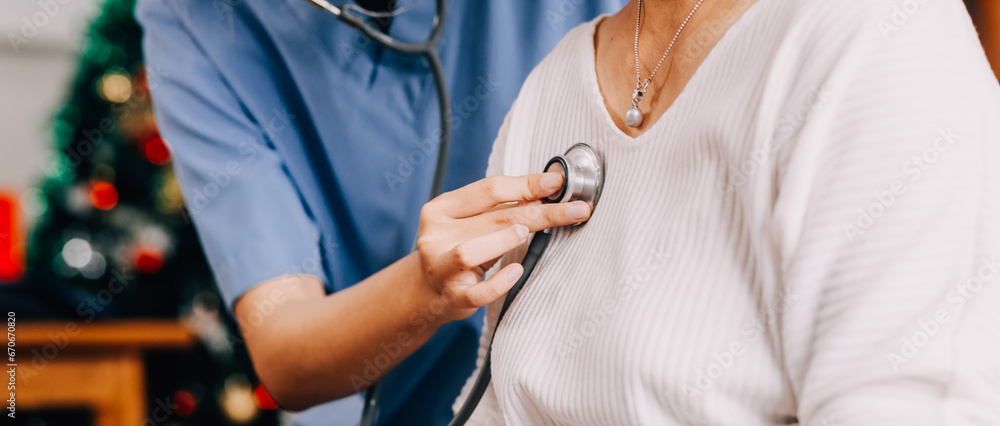 Lady coming to clinic for heart and lungs checkup, male doctor using ...