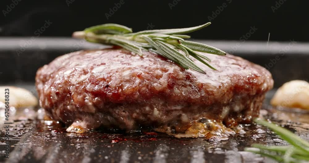 Pork cutlet for burger fried in frying pan. Cinematic advertisement ...